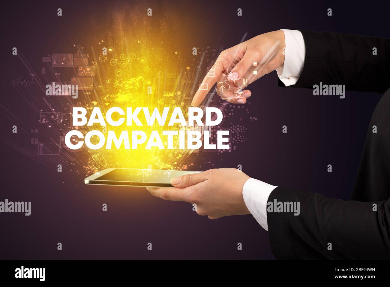 Close-up of a touchscreen with BACKWARD COMPATIBLE inscription ...