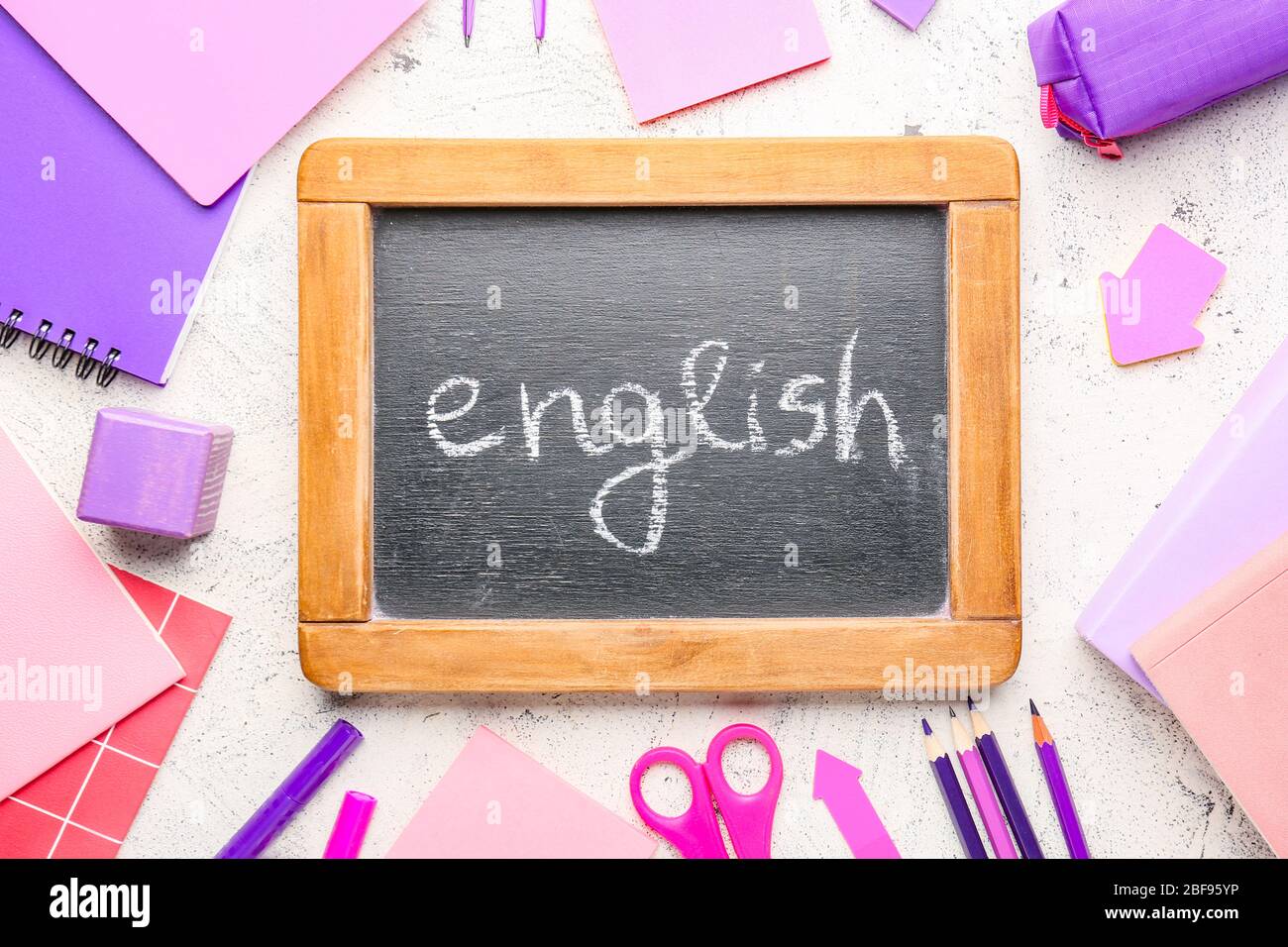 Chalkboard with text ENGLISH and stationery on white background Stock ...