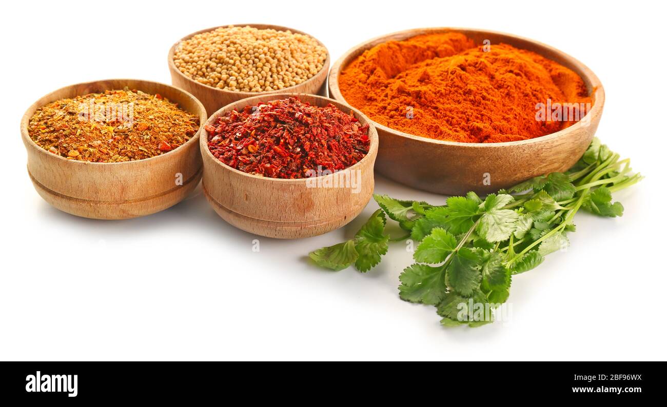 Different spices on white background Stock Photo - Alamy