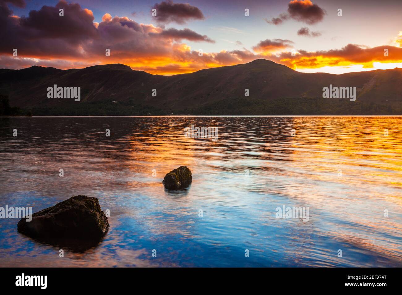 Hilly landscape at sunset hi-res stock photography and images - Alamy
