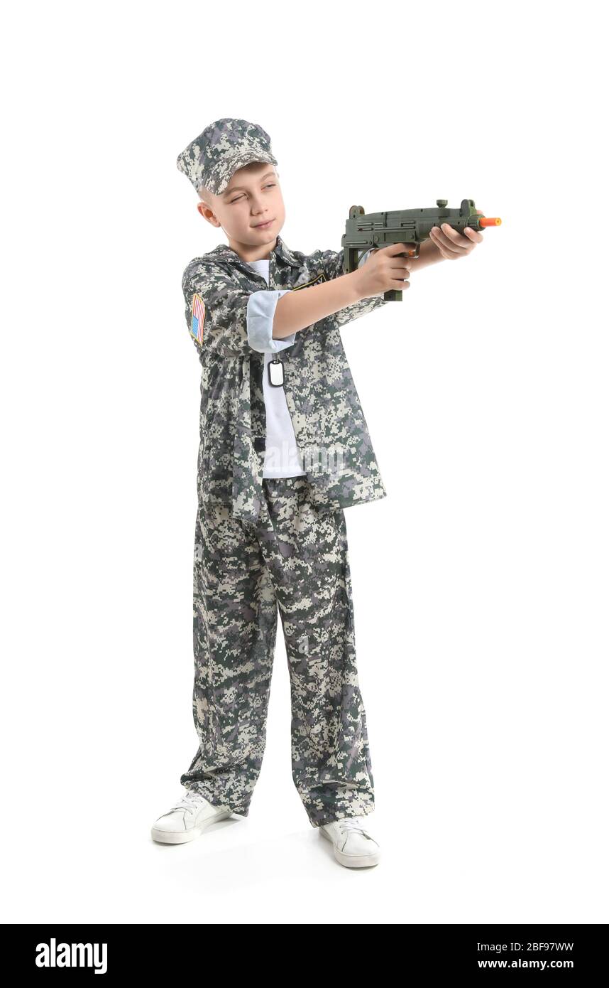 Cute little soldier with toy gun on white background Stock Photo - Alamy