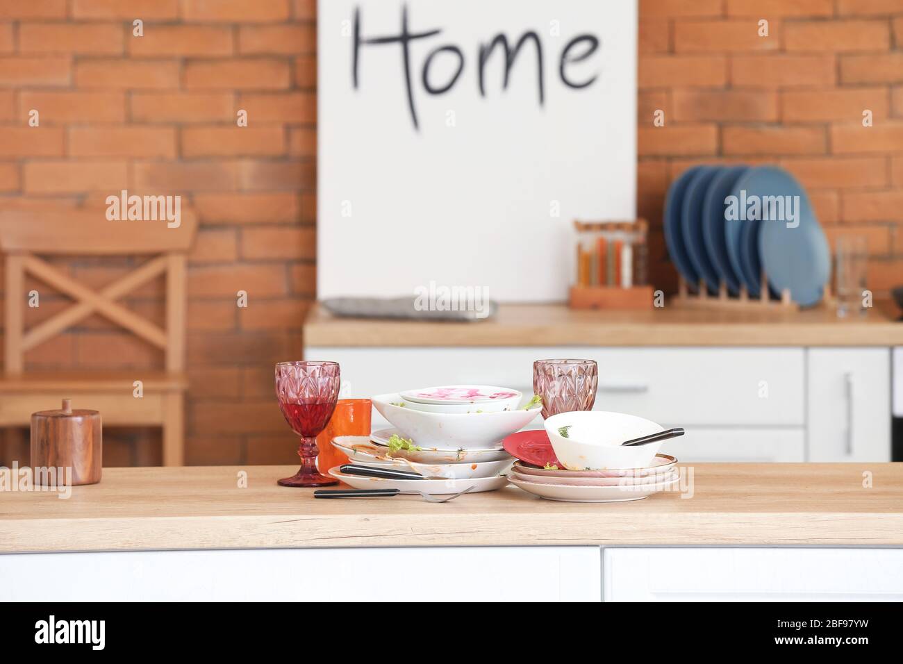 Dirty plates kitchen table hi-res stock photography and images - Alamy
