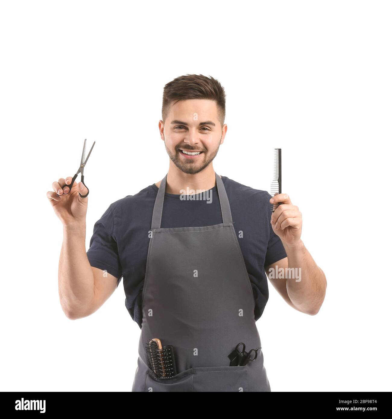 Portrait of male hairdresser on white background Stock Photo - Alamy