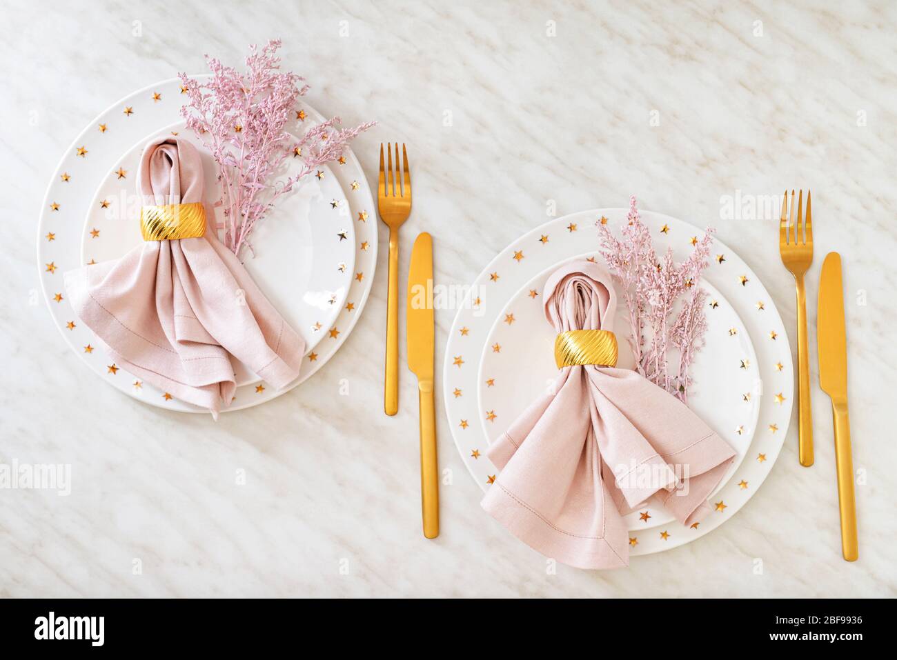 Beautiful simple table setting on white background Stock Photo - Alamy