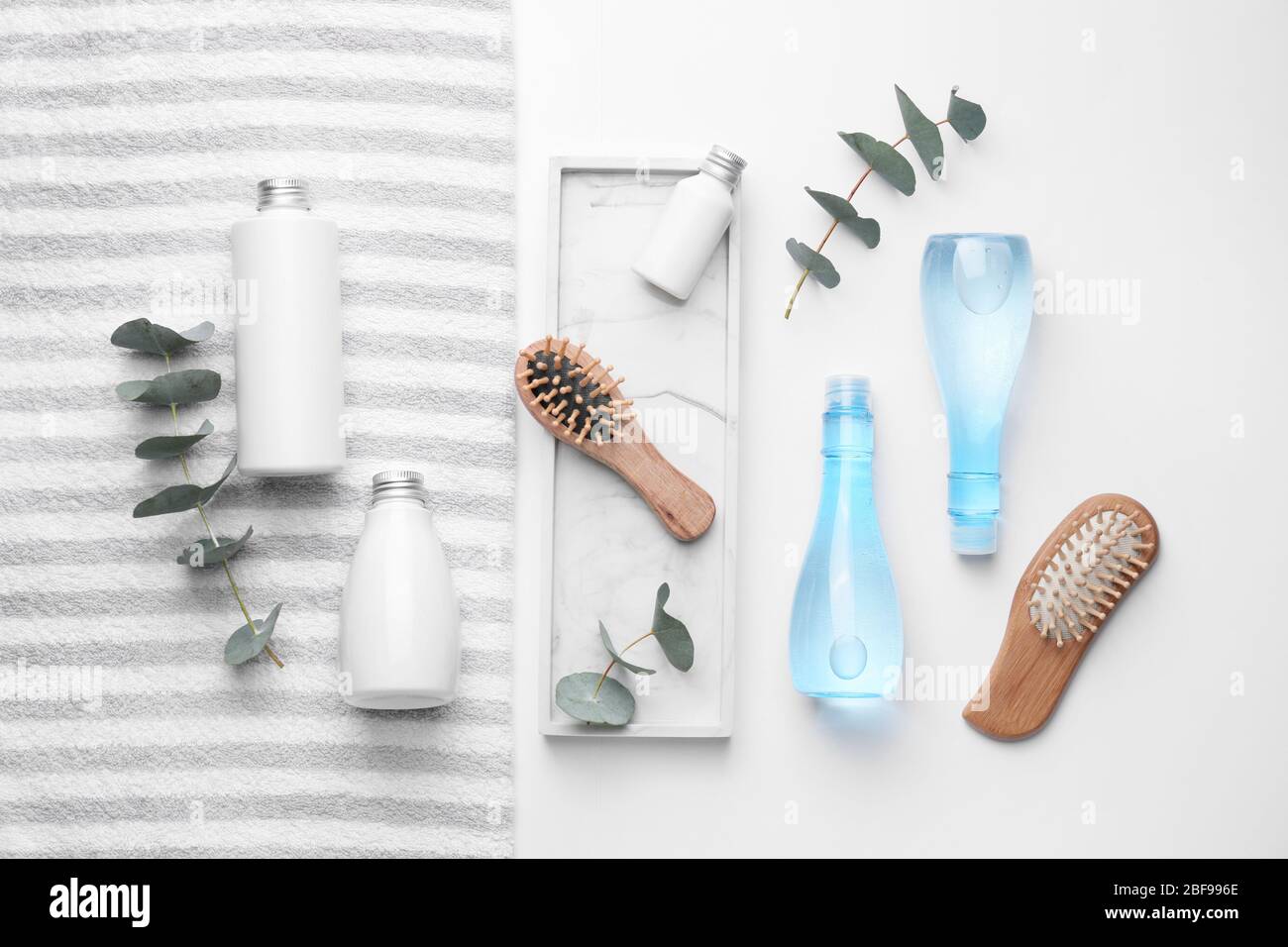 Composition with shampoo and cosmetics for hair on white background ...