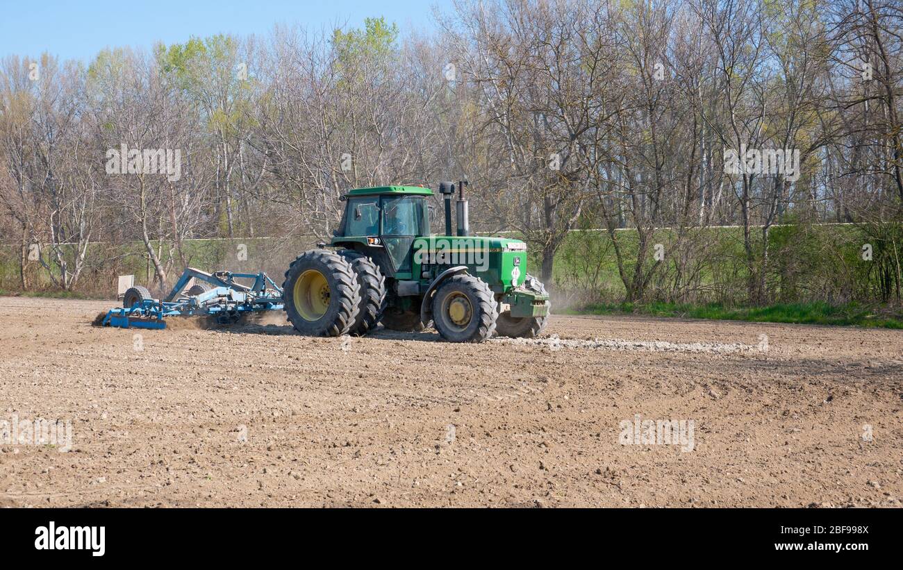 Nagybajcs Hungary 04 04 2020: A large, modern John Deere 4755 tractor ...
