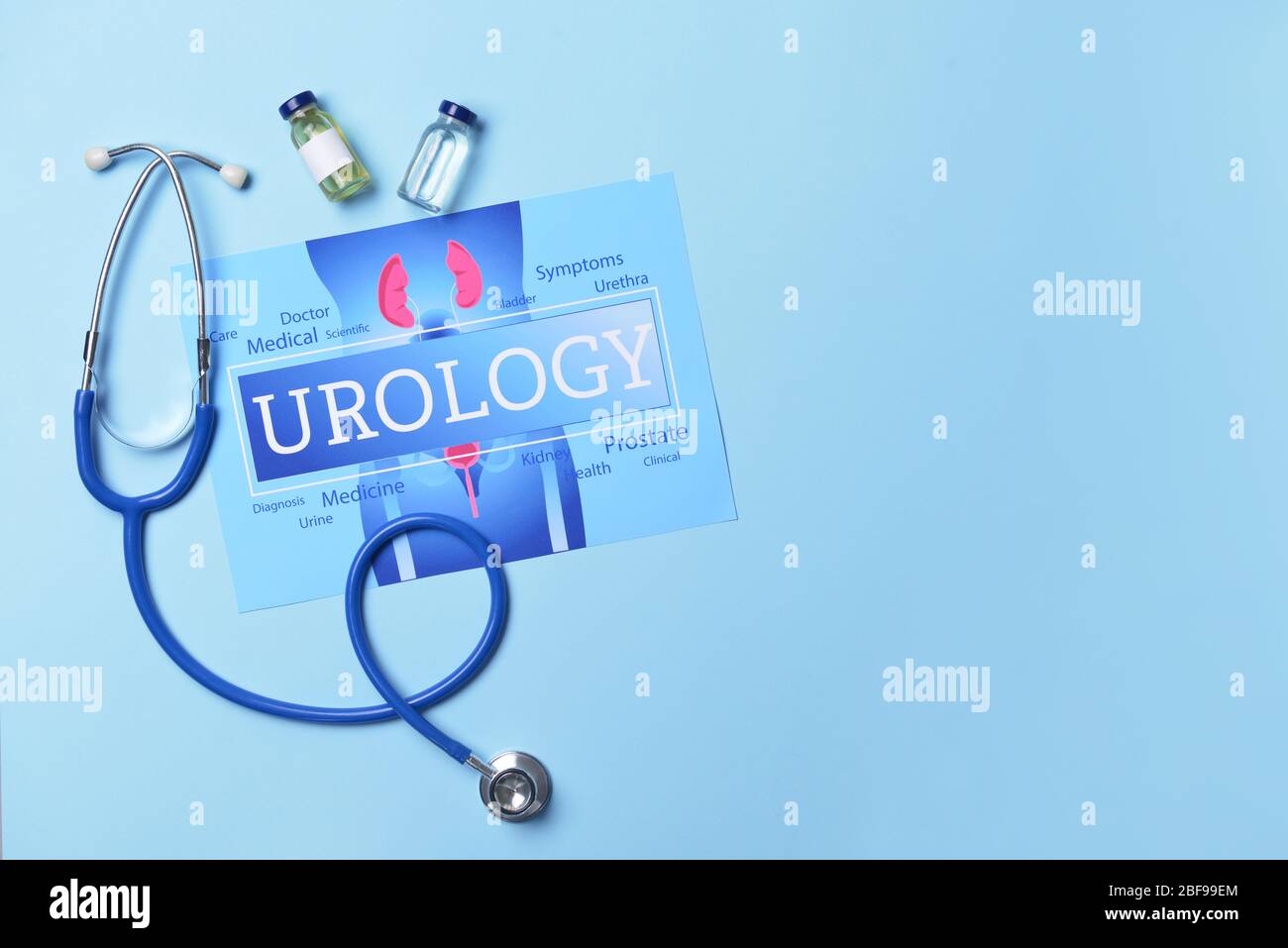Paper sheet with text UROLOGY, stethoscope and urine sample on color ...