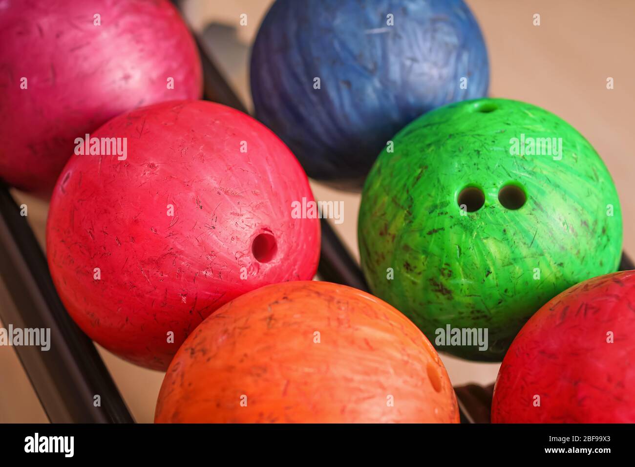 Stand with balls in bowling club, closeup Stock Photo - Alamy