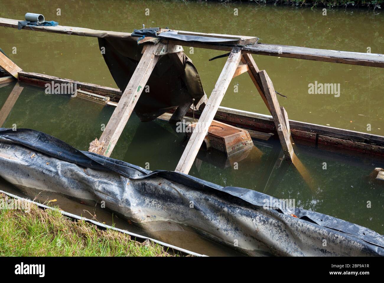 England, Buckinghamshire, Capsized Narrowboat on Grand Union Canal near ...