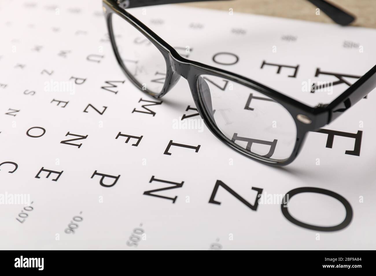 Eye test chart with eyeglasses, closeup Stock Photo - Alamy