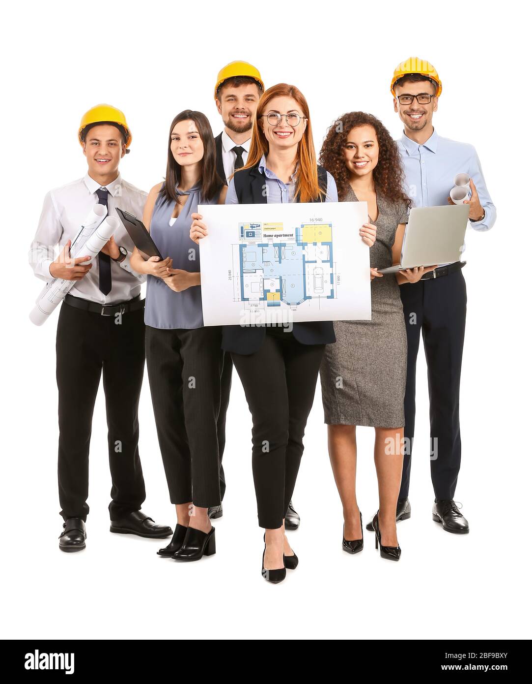 Group of young architects on white background Stock Photo - Alamy