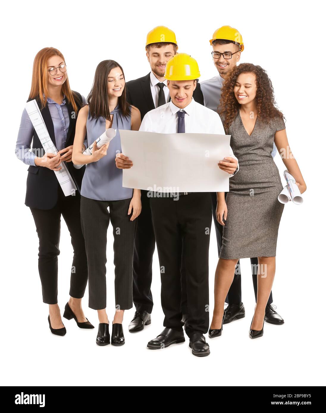 Group of young architects on white background Stock Photo - Alamy