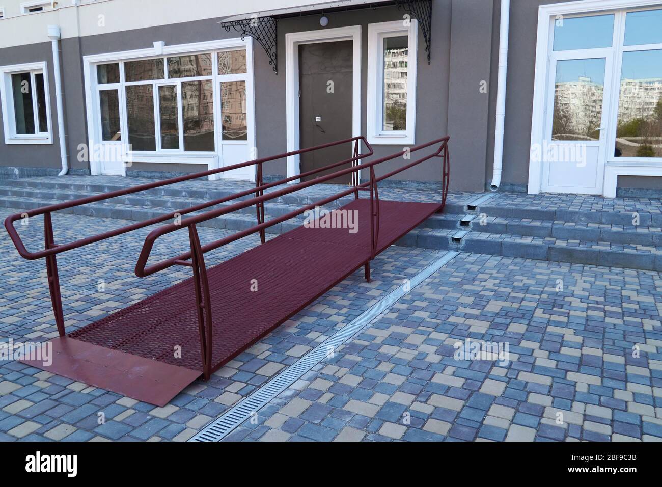 Wheelchair access ramp for entrance of residential multistory building ...