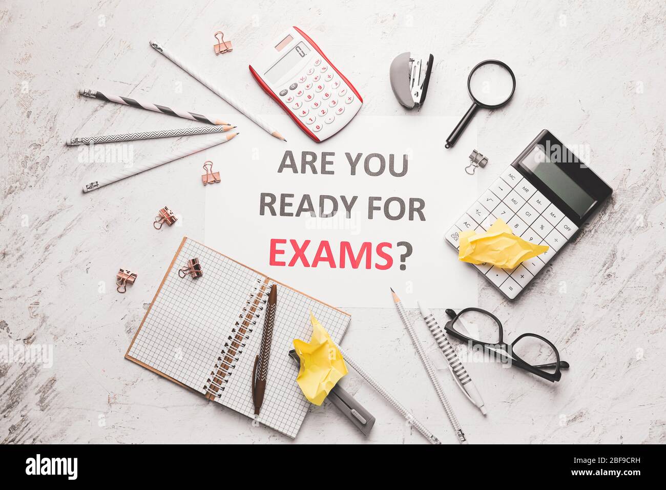 Stationery and paper sheet with text ARE YOU READY FOR EXAMS? on white ...