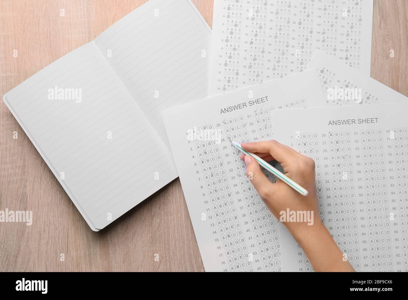 Hand passing forms hi-res stock photography and images - Alamy