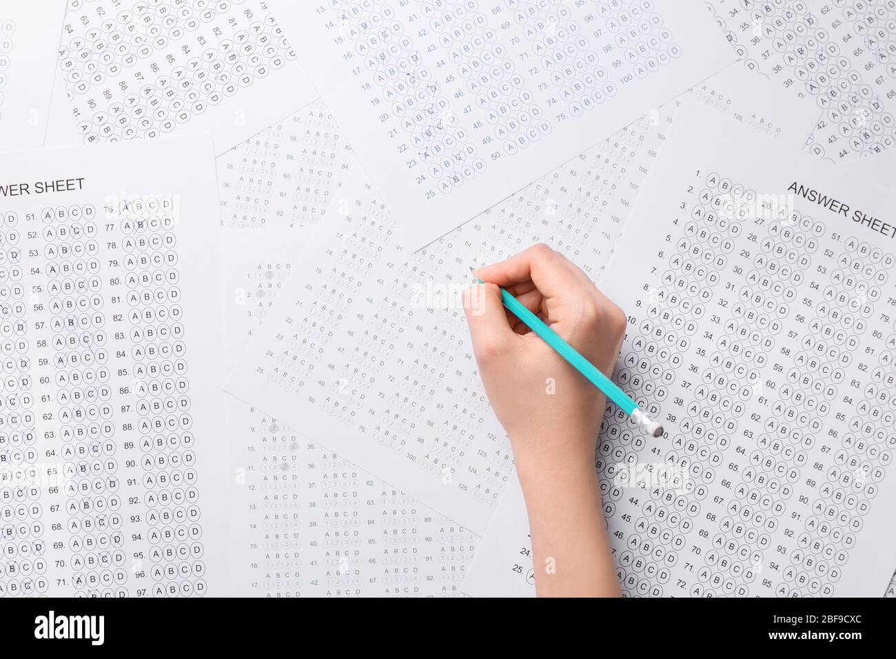 Girl passing school test, top view Stock Photo - Alamy
