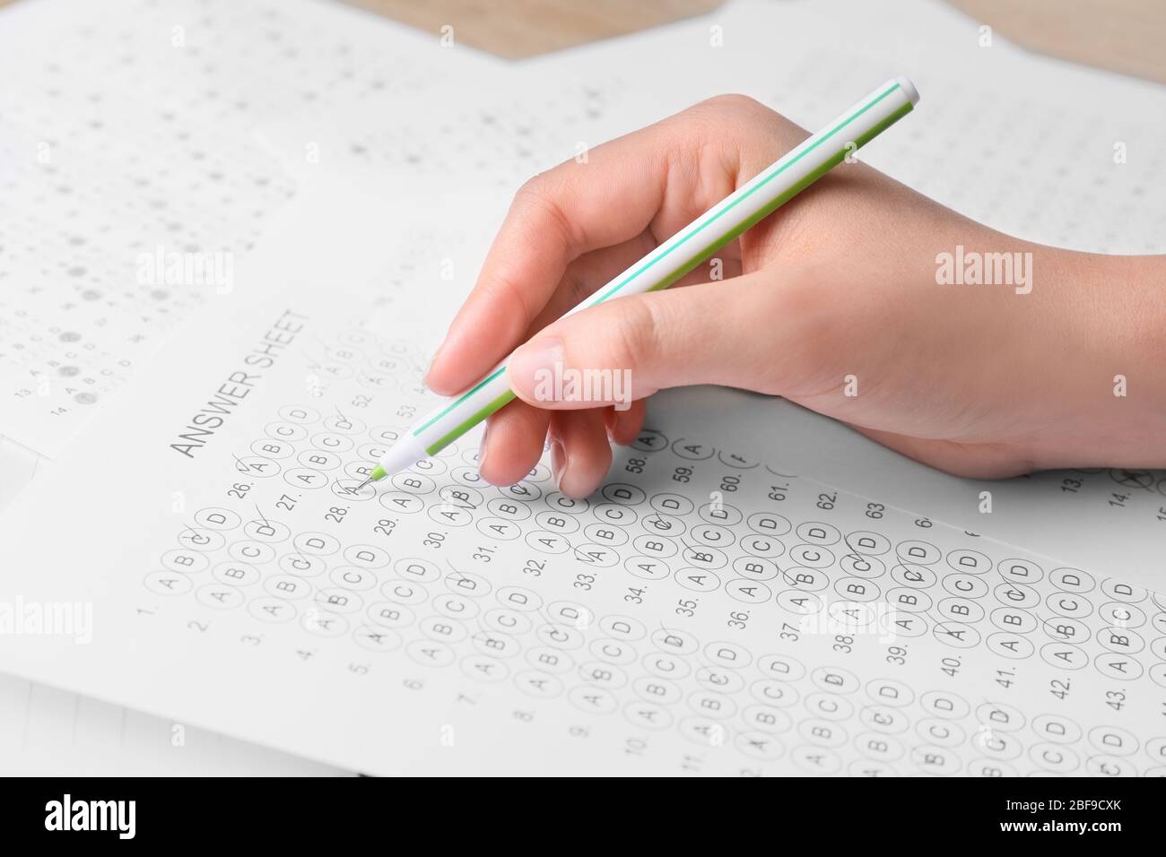 Girl passing school test, closeup Stock Photo - Alamy
