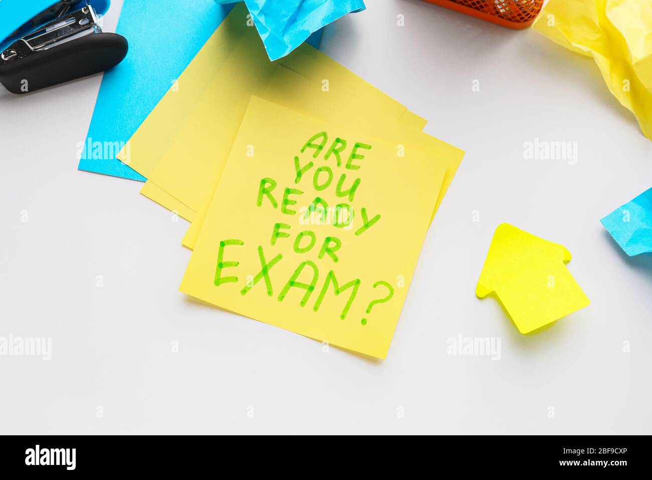 Paper sheets with text ARE YOU READY FOR EXAMS? on white background ...