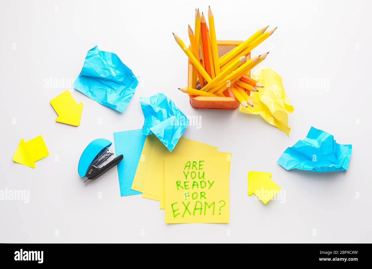 Stationery and paper sheets with text ARE YOU READY FOR EXAMS? on white ...