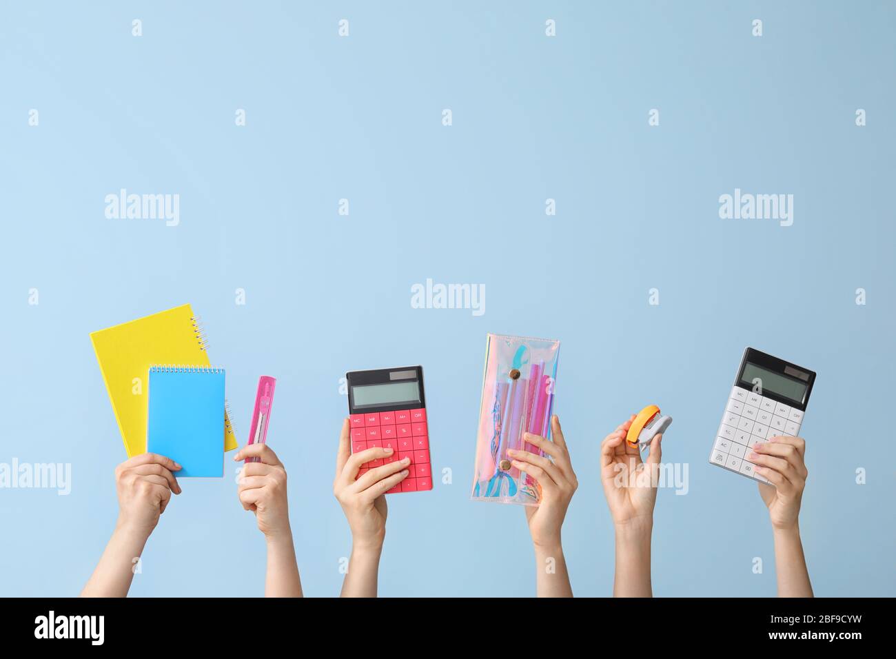 Many hands different school hi-res stock photography and images - Alamy