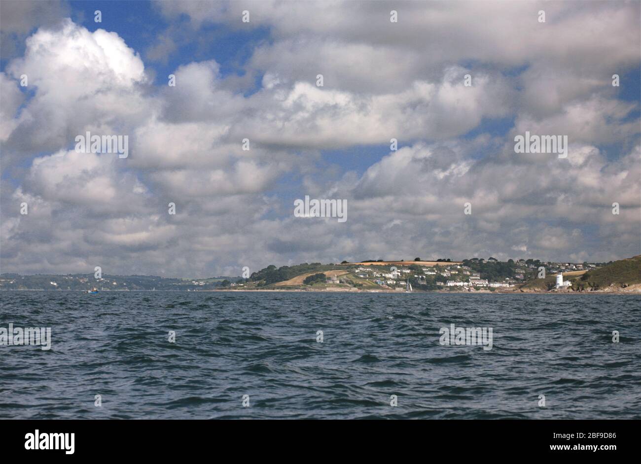 The entrance to Carrick Roads, with St Mawes ahead, and the lighthouse ...