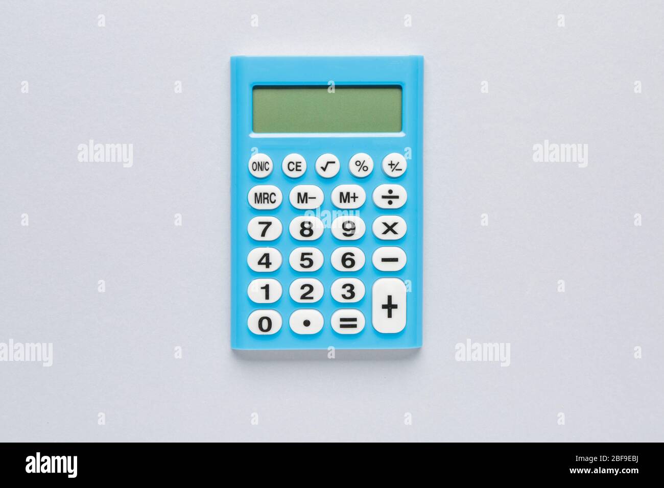 Modern calculator on grey background Stock Photo - Alamy