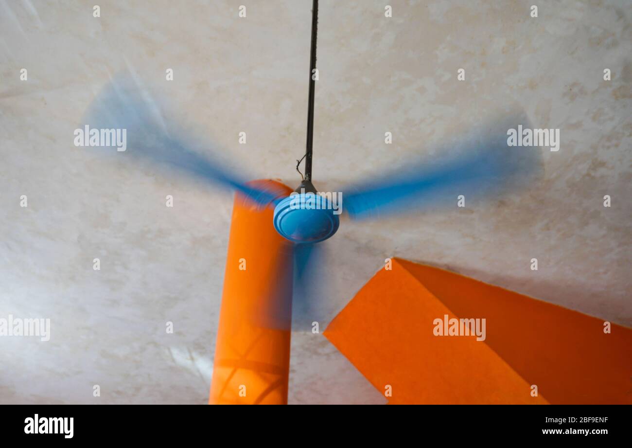 spinning ceiling fan Stock Photo - Alamy