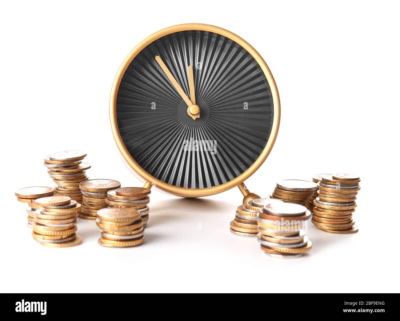 Clock and coins on white background. Time management concept Stock ...