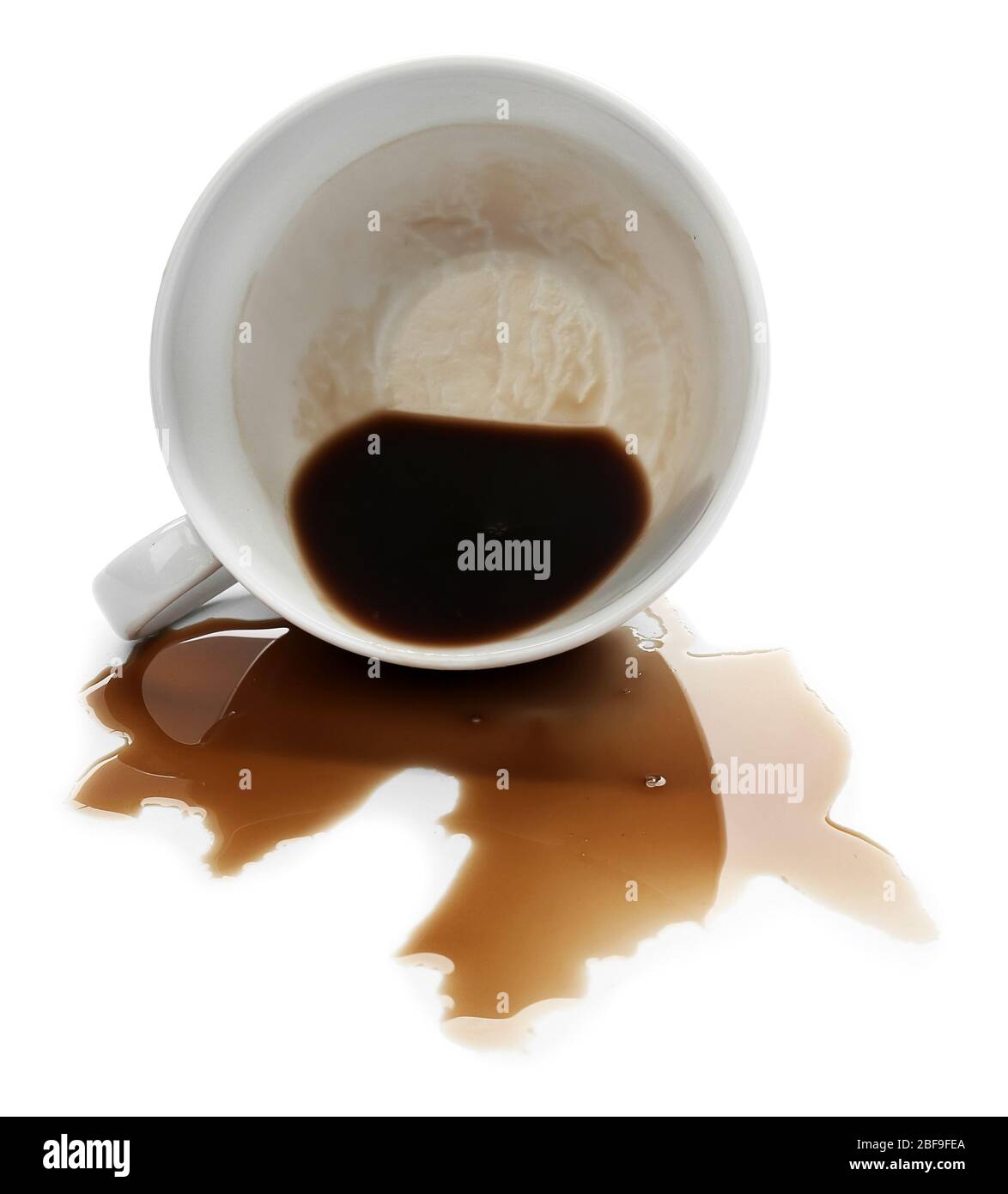 Overturned cup and spilled coffee on white background Stock Photo - Alamy