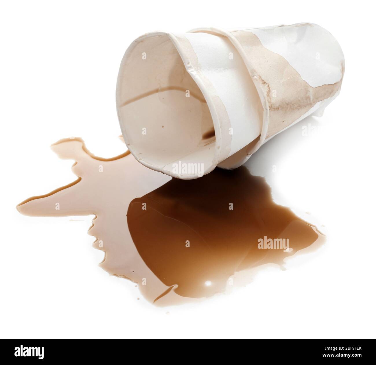 Overturned paper cups and spilled coffee on white background Stock ...