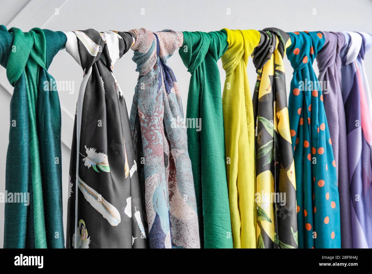 Scarves on rack hi-res stock photography and images - Alamy