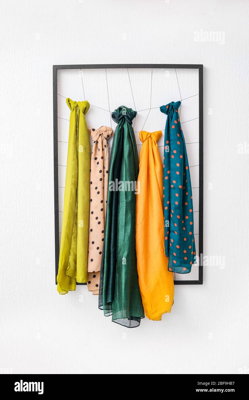 Frame with different beautiful scarves on white background Stock Photo ...