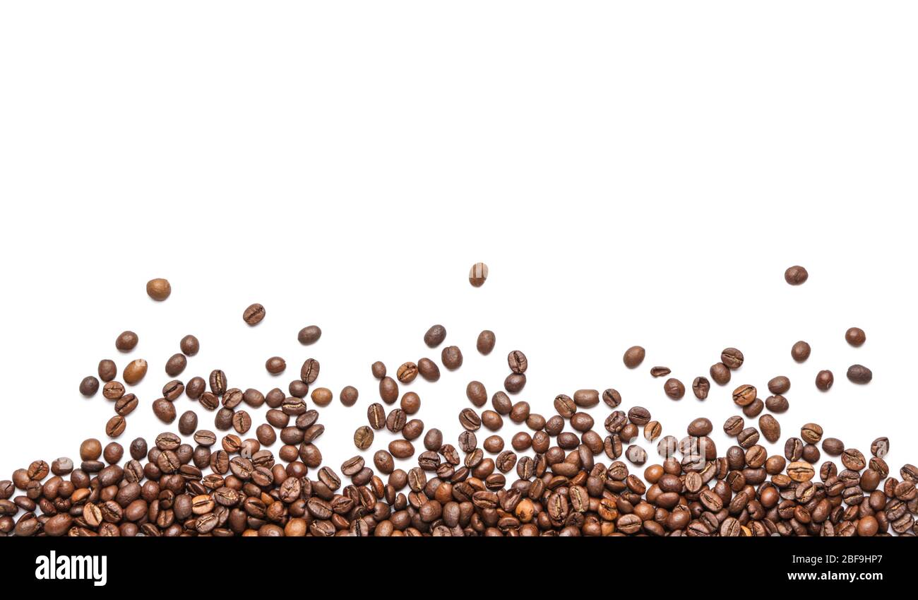 Many coffee beans on white background Stock Photo - Alamy