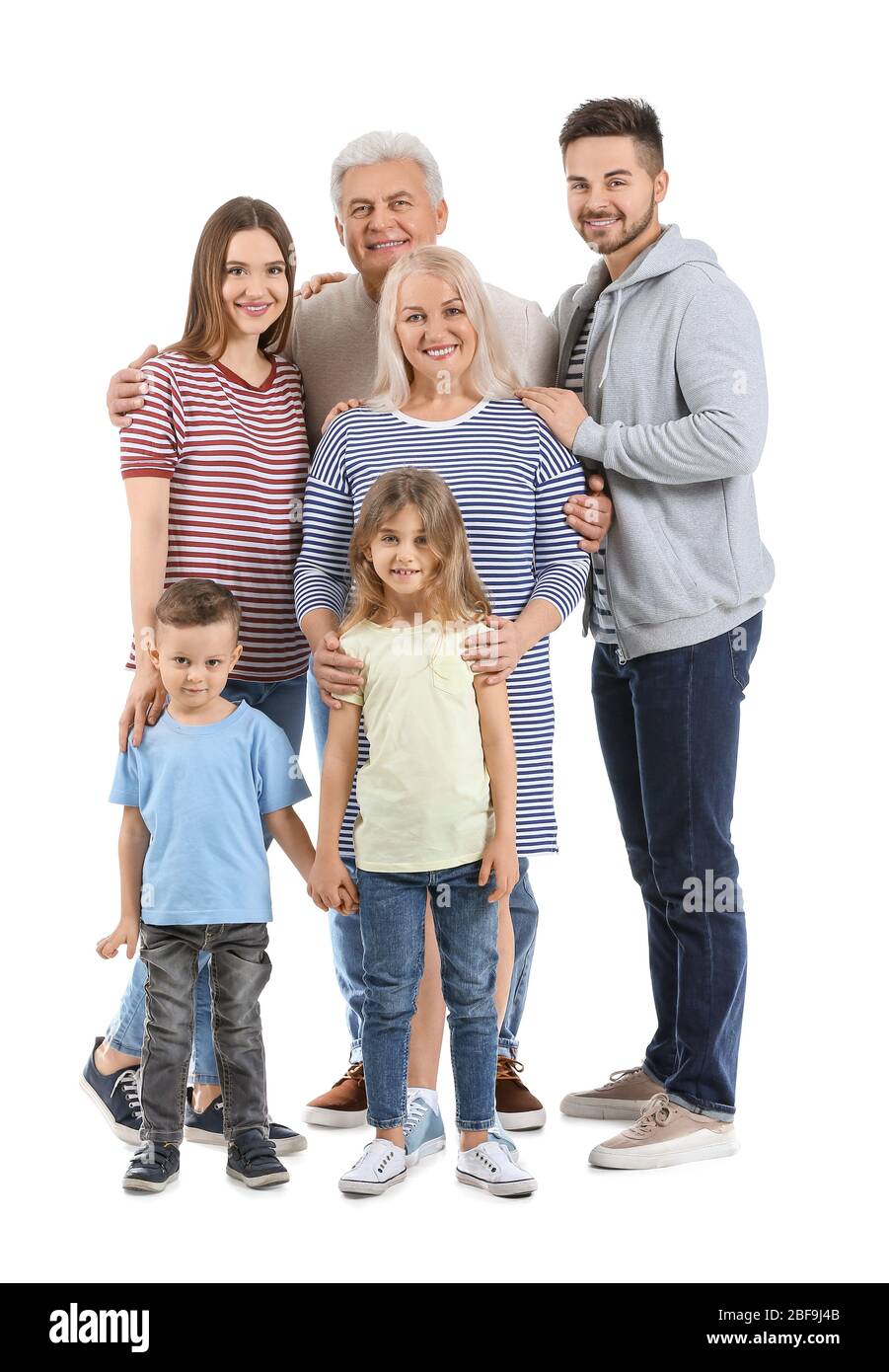 Portrait of big family on white background Stock Photo - Alamy