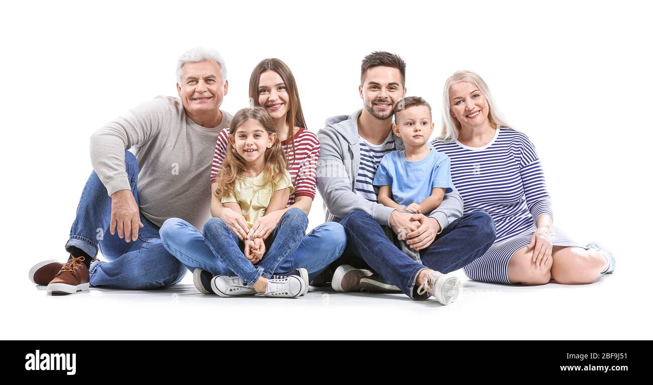 Portrait of big family on white background Stock Photo - Alamy