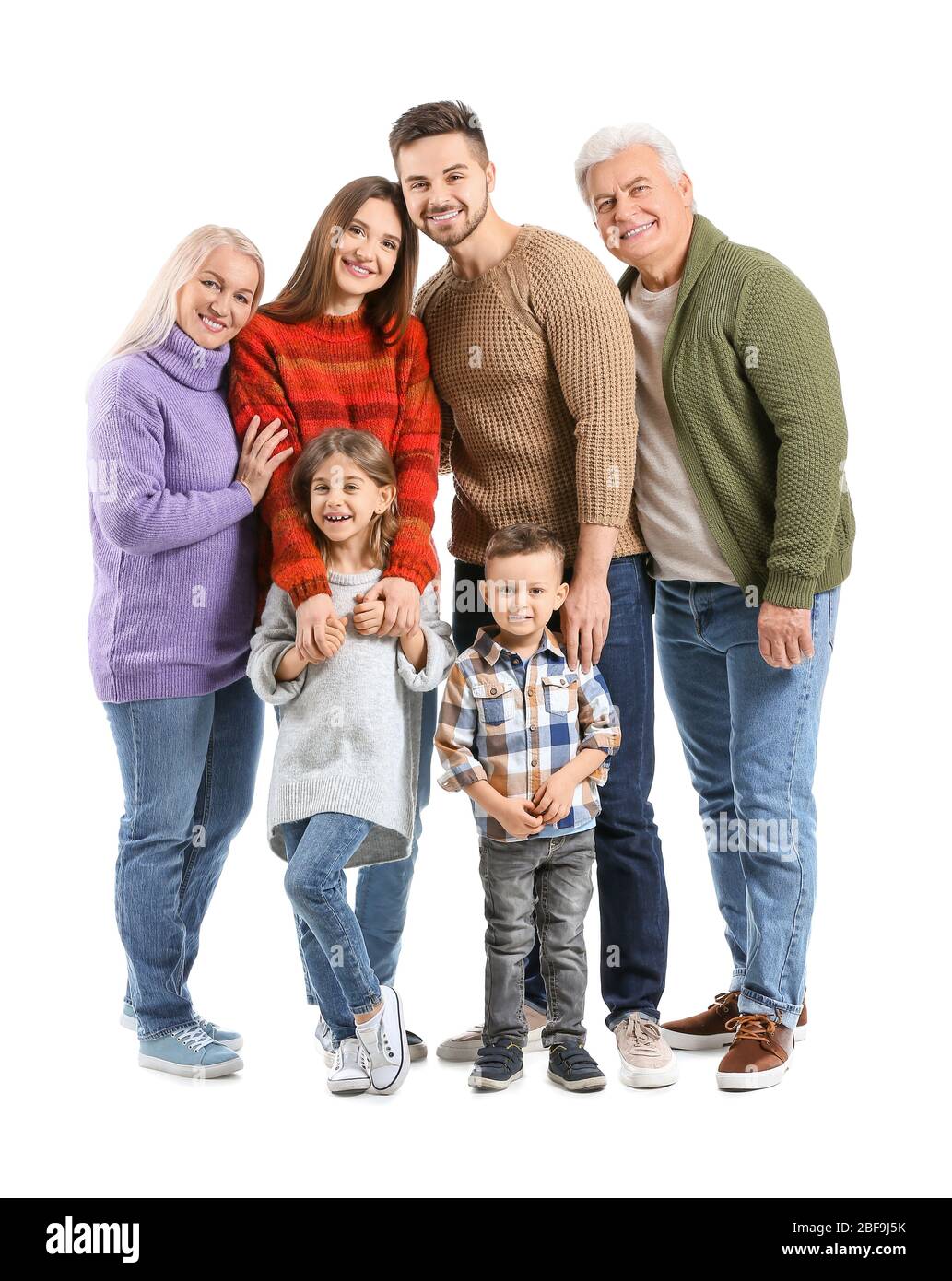 Portrait of big family on white background Stock Photo - Alamy