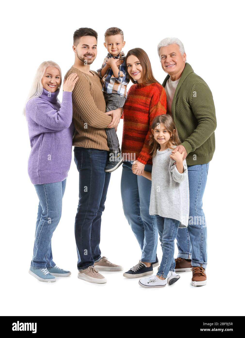 Portrait of big family on white background Stock Photo - Alamy