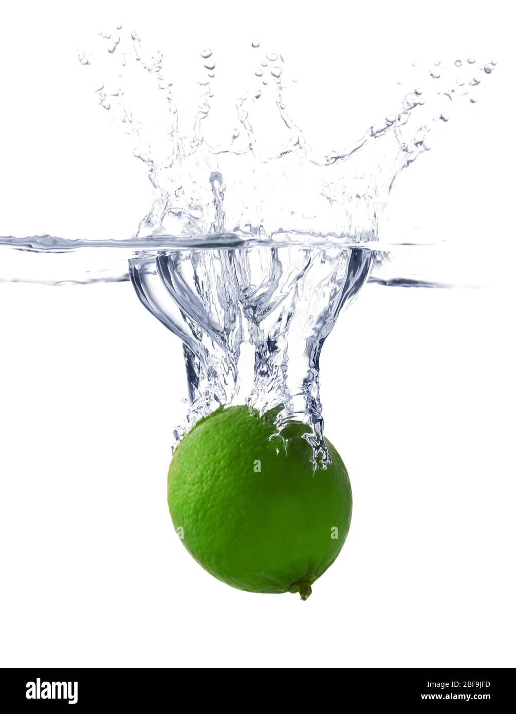 Falling of fresh lime into water against white background Stock Photo ...