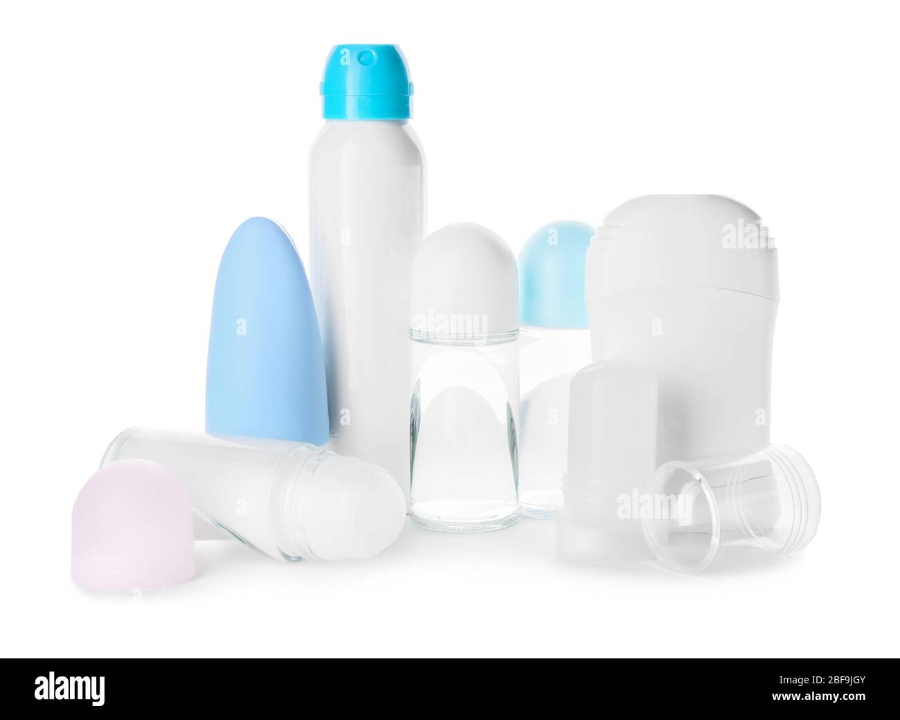 Different deodorants on white background Stock Photo - Alamy