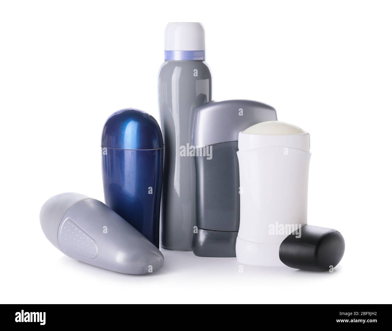 Different deodorants on white background Stock Photo - Alamy