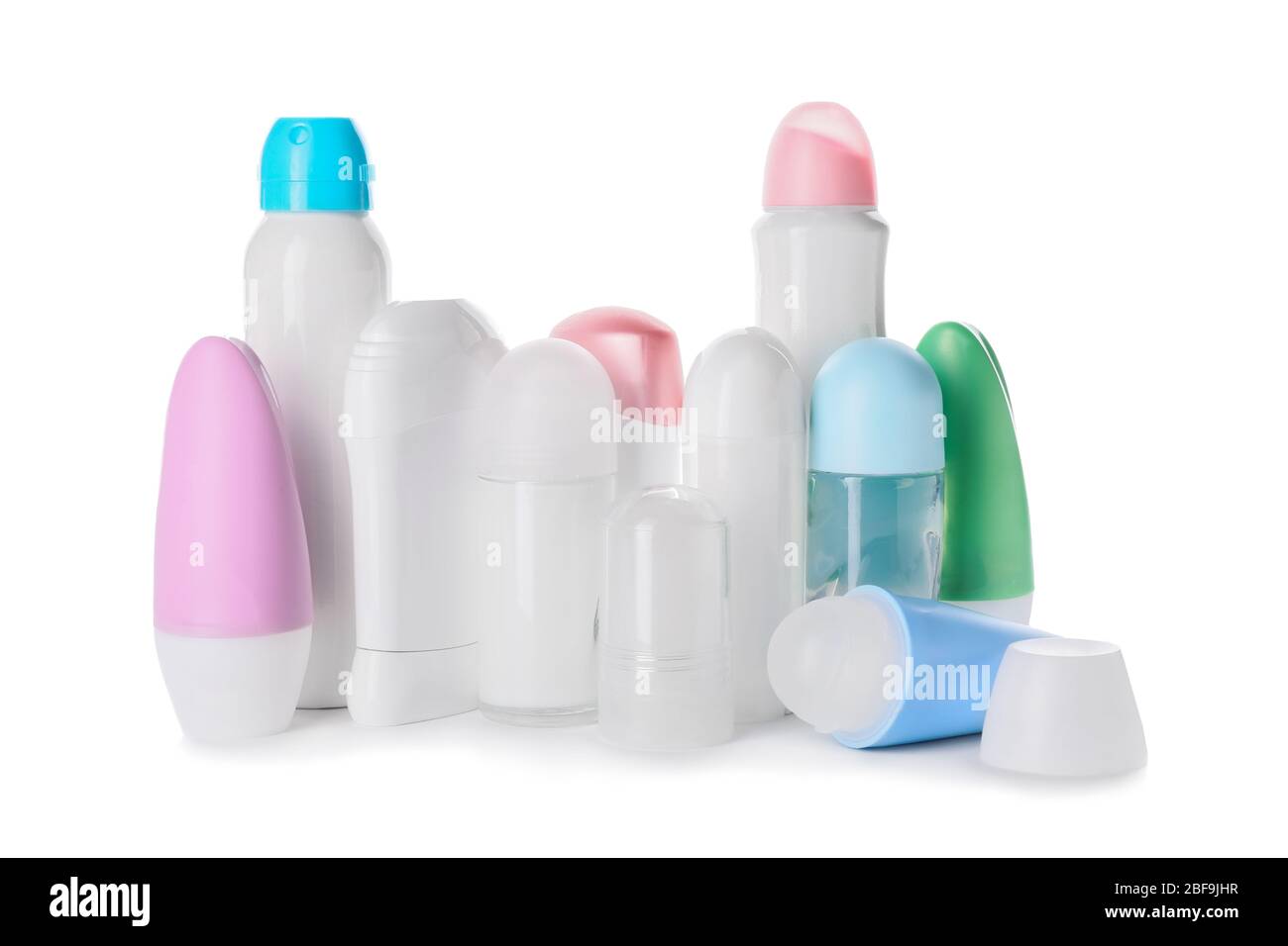 Different deodorants on white background Stock Photo - Alamy