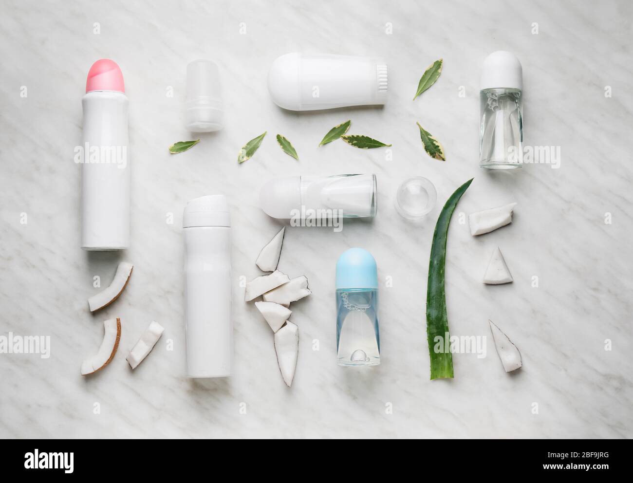 Different deodorants on light background Stock Photo - Alamy