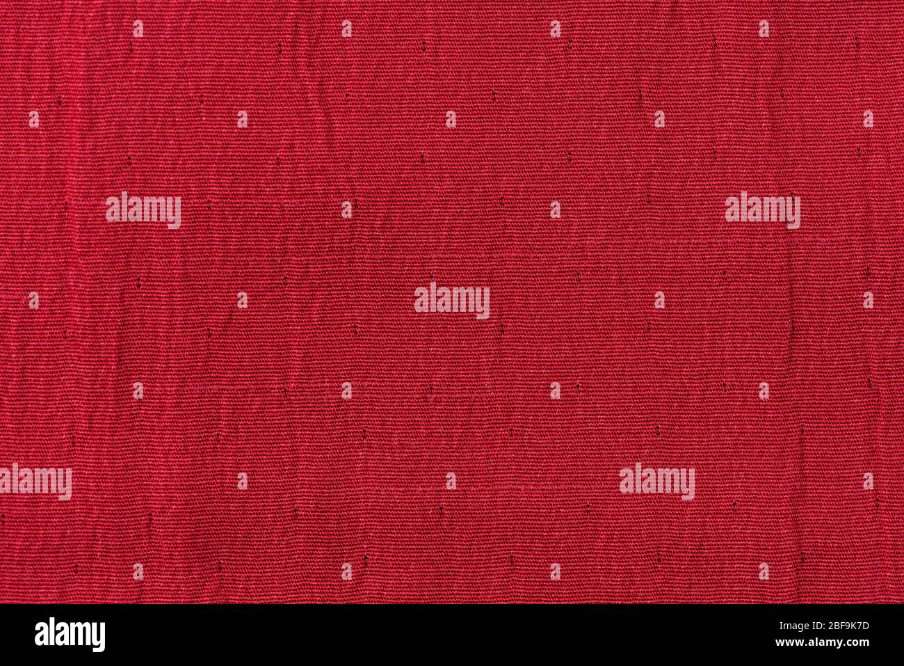 Closeup detail of red fabric texture background Stock Photo - Alamy