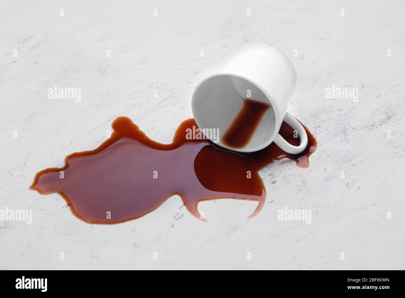 Overturned cup spilled coffee hi-res stock photography and images - Alamy