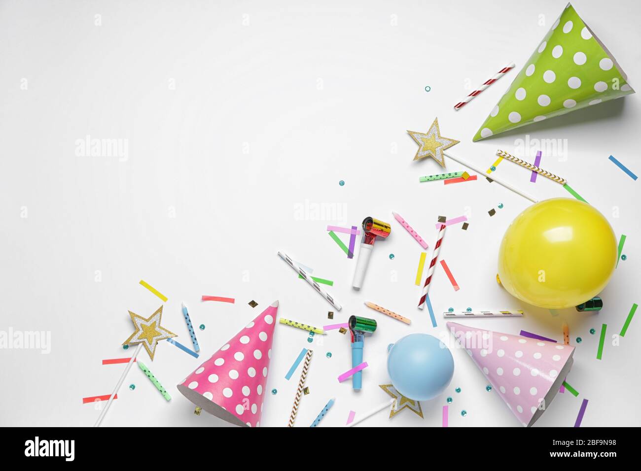 Birthday composition on white background Stock Photo - Alamy