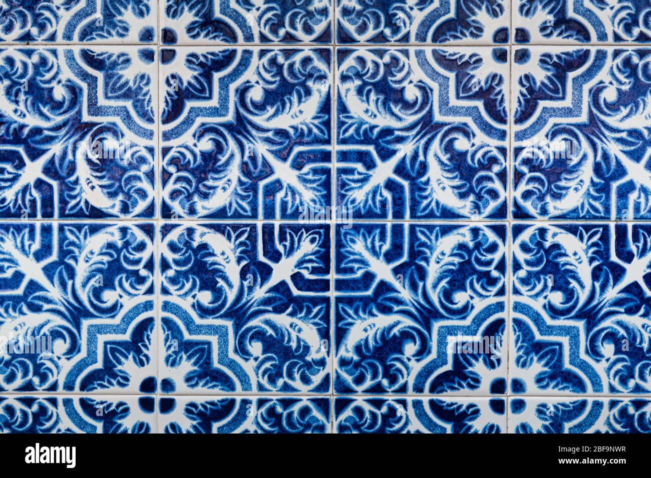 Blue and white ornate Portuguese tiles. Traditional azulejo patterns ...