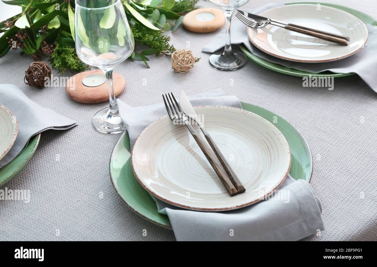 Beautiful table setting for festive dinner Stock Photo - Alamy