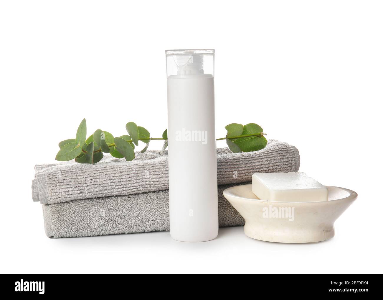 Shampoo, towels and soap on white background Stock Photo - Alamy