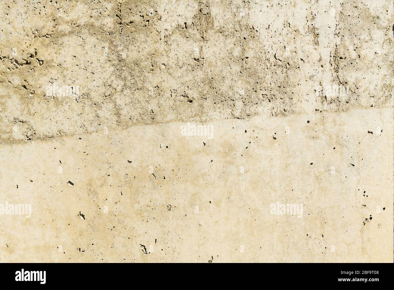 Rusty stone concrete surface in tan color, detailed natural texture ...