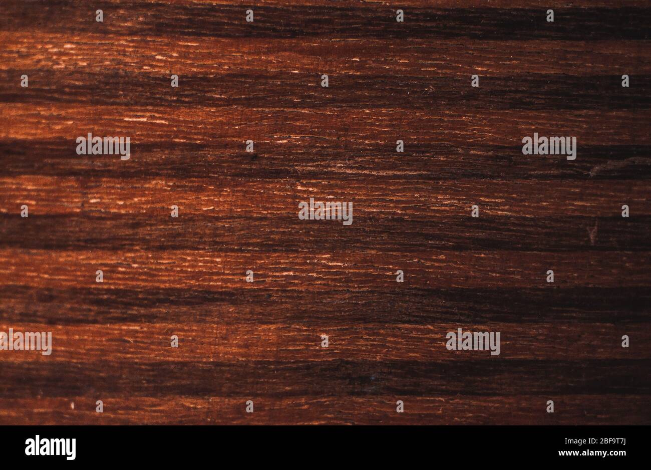 dark wooden background with scratches. Textured backing of the table ...